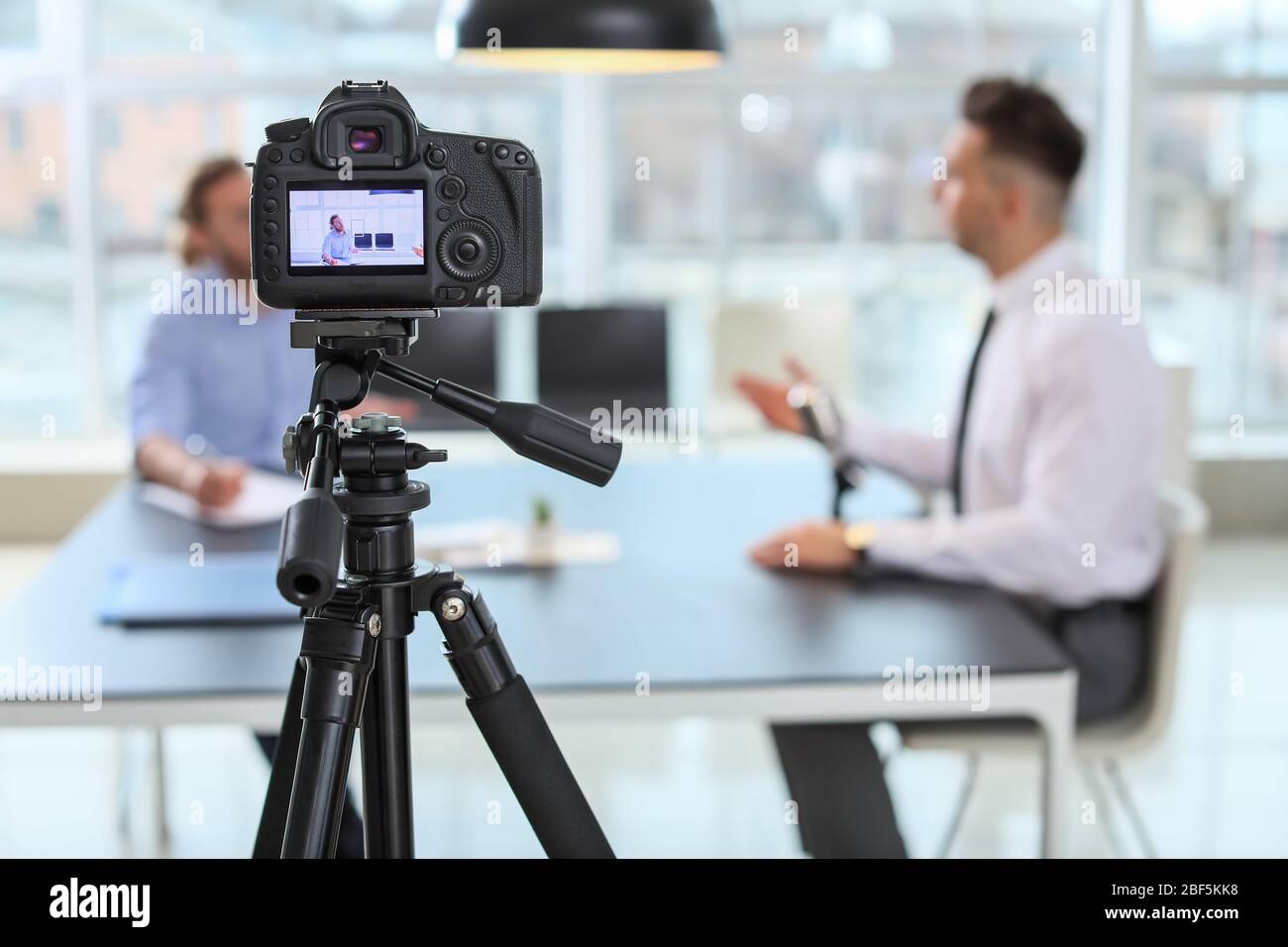 Filming of job interview with applicant in office Stock Photo - Alamy