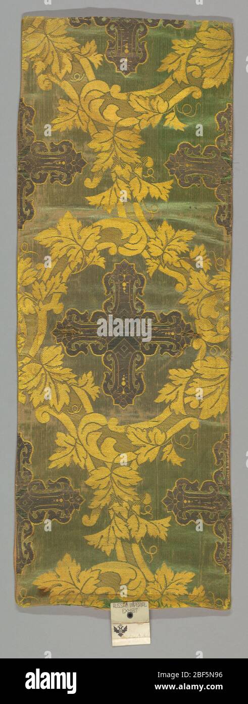 Textile. Maltese cross-shapes in two types of metal within circles of ...