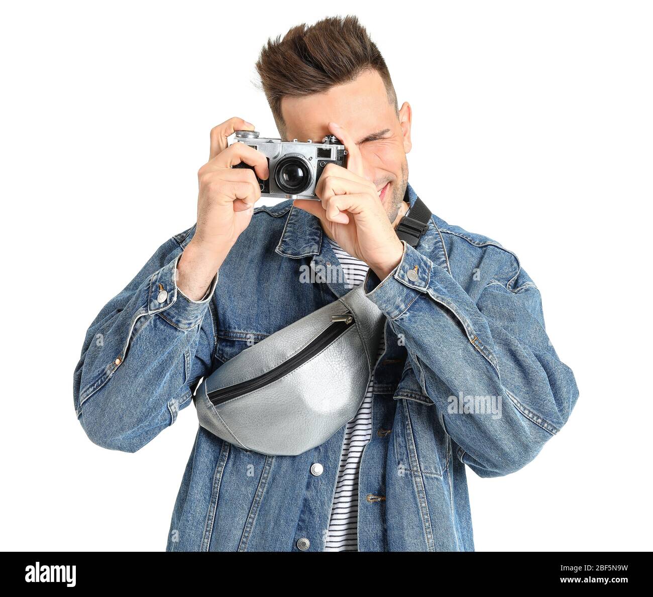 Male tourist with photo camera on white background Stock Photo - Alamy