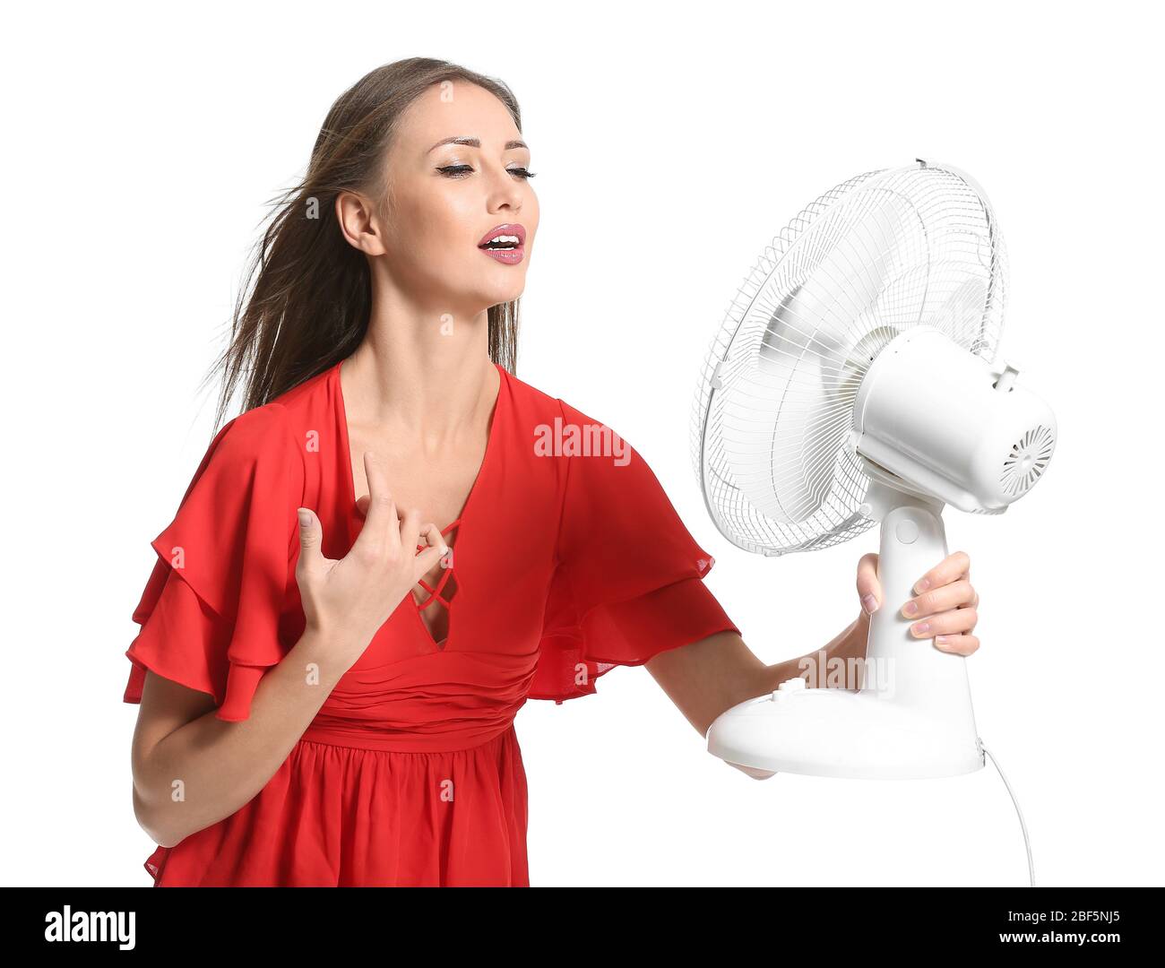 Young woman fan cooling Cut Out Stock Images & Pictures - Alamy