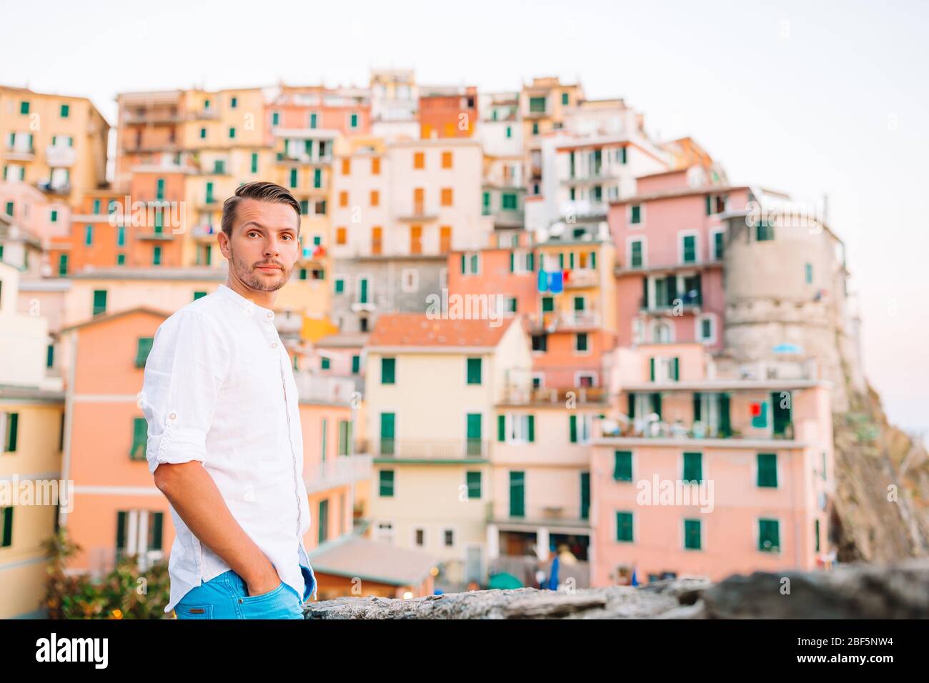 Man tourist outdoors in italian village on vacation Stock Photo - Alamy