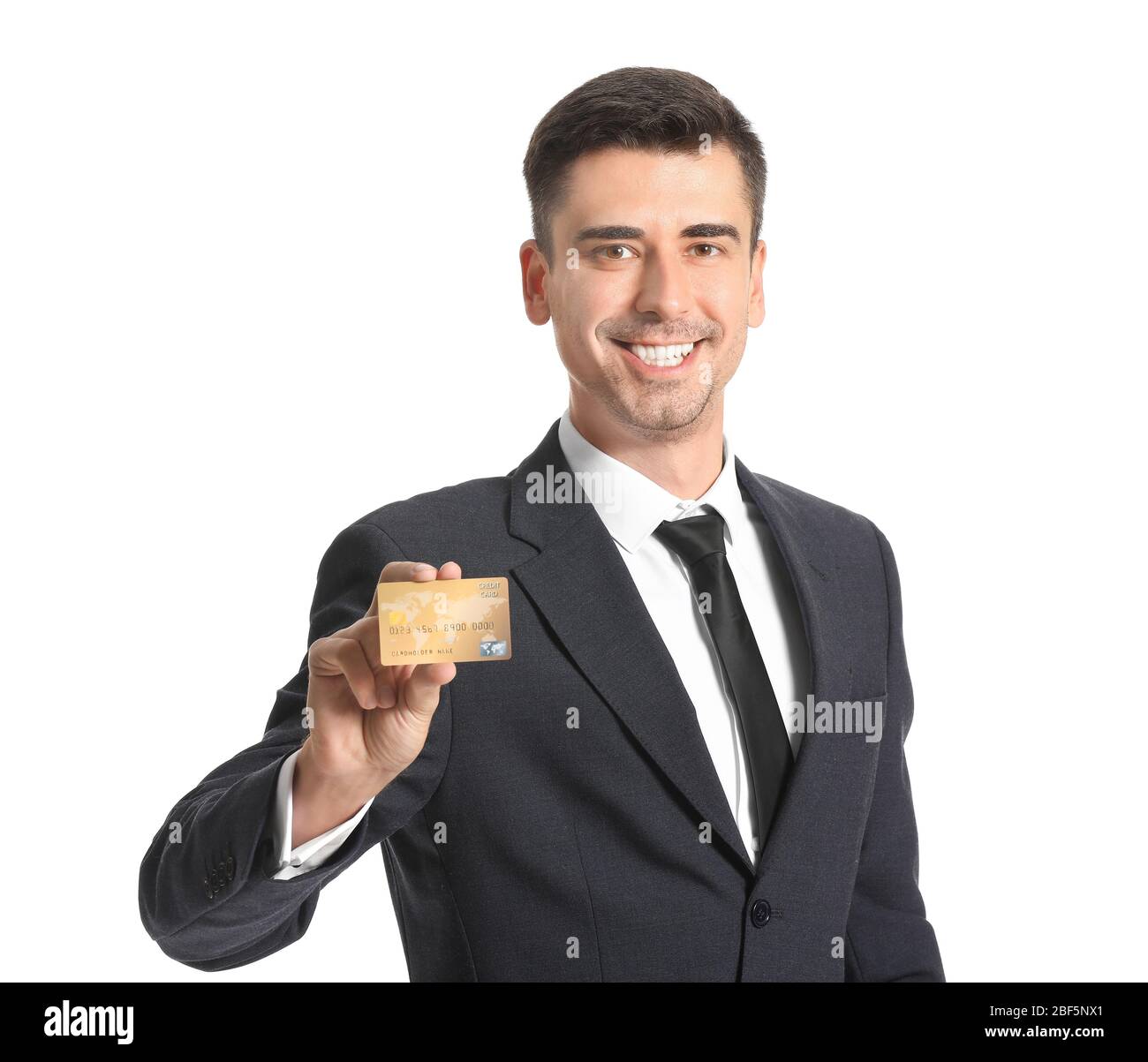 Happy male bank manager with credit card on white background Stock ...