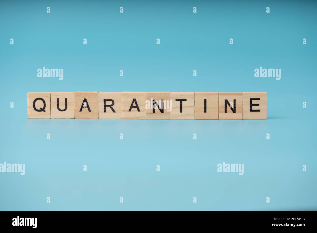 Quarantine infection concept. Letter of wooden blocks Stock Photo - Alamy