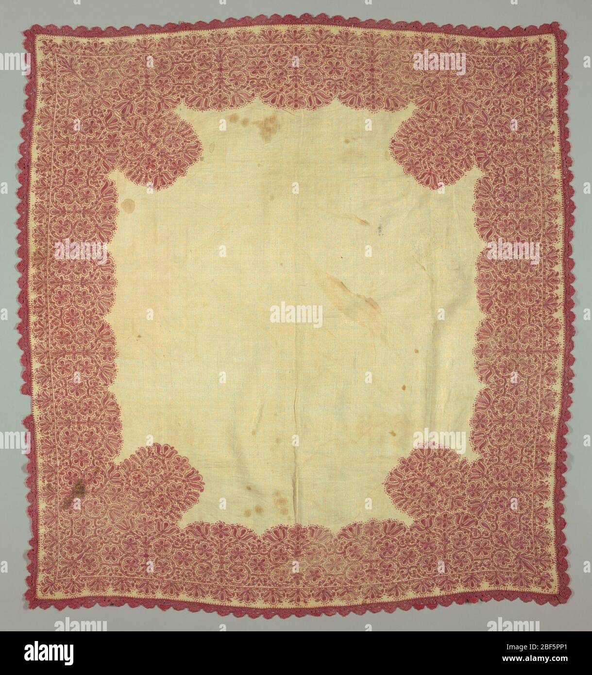 Square. Embroidered pattern of tightly compacted scrolling vines and ...