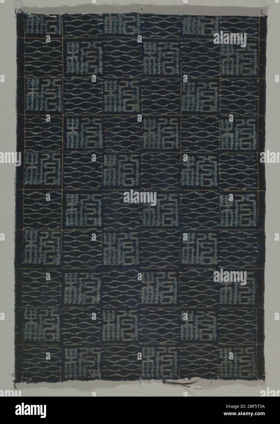 Textile. Textile with checkerboard desing of two alternating geometric ...