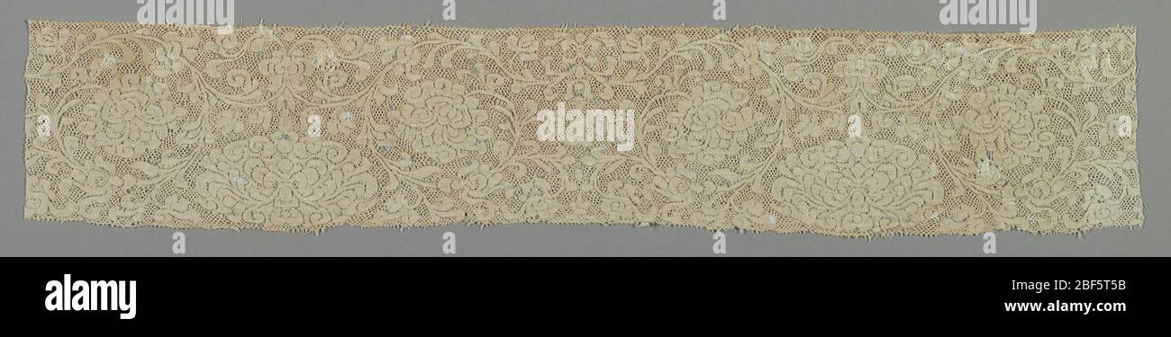 Border. Oval floral clusters flanked by densely foliated scrolls that ...