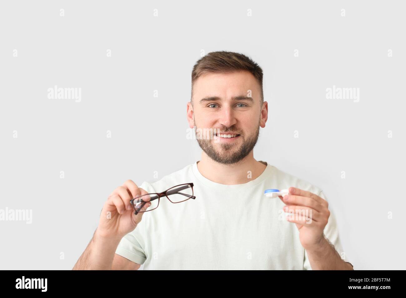 Handsome man contact lens hi-res stock photography and images - Alamy