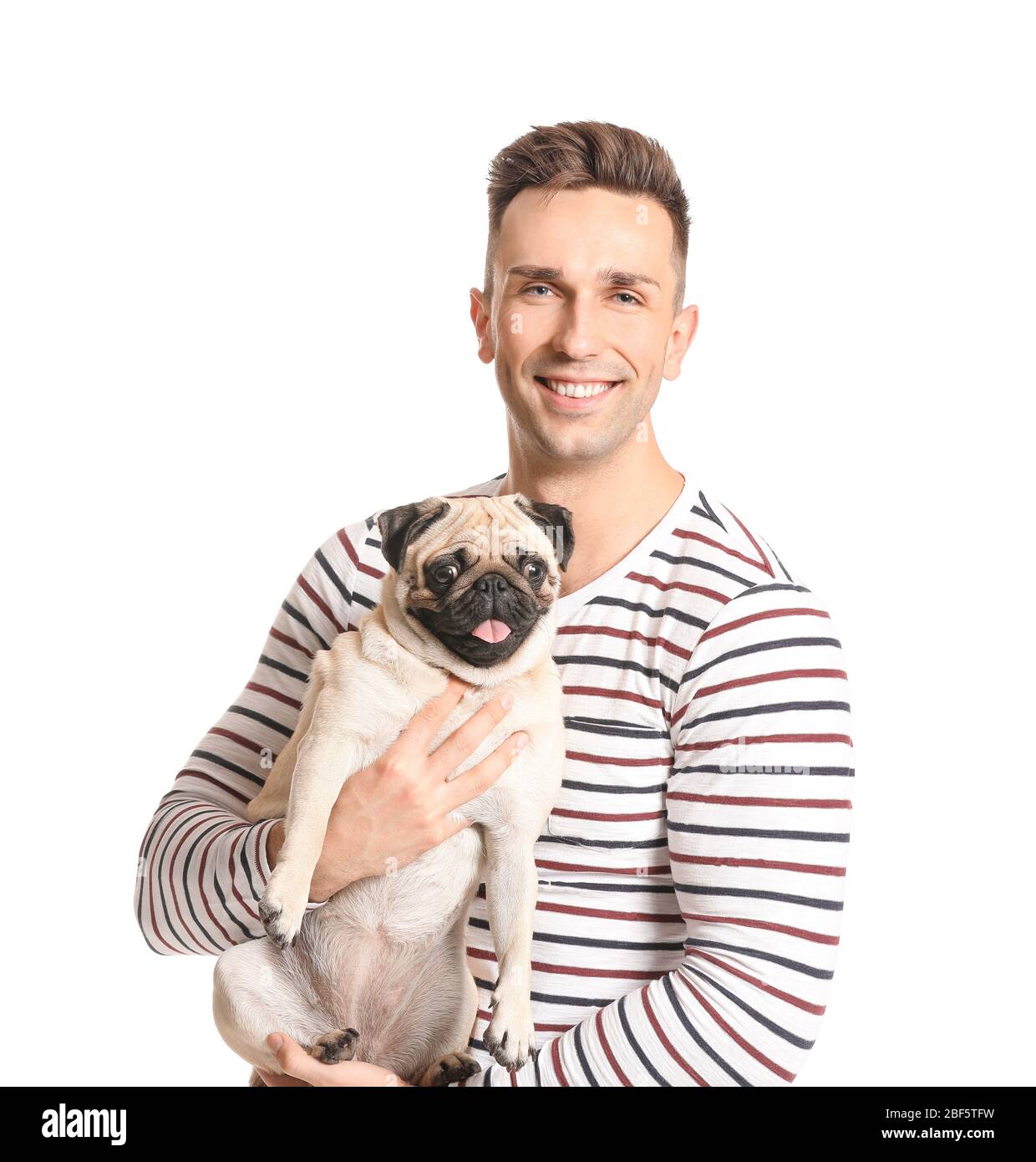 Handsome man with cute pug dog on white background Stock Photo - Alamy
