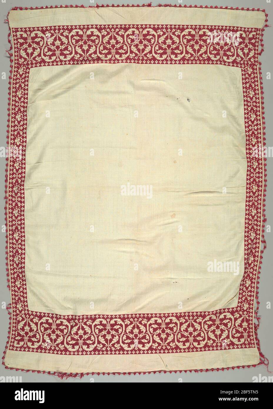 Towel. Towel with an embroidered end and side borders in red. The ...