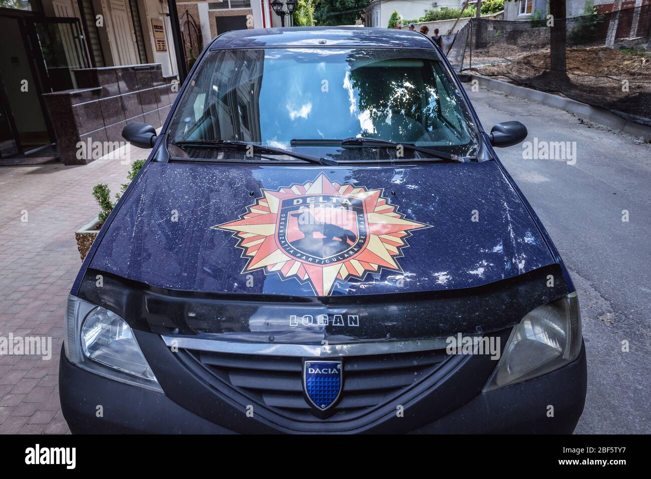 Dacia Logan car of Delta Forta security service in Chisinau, capital of ...