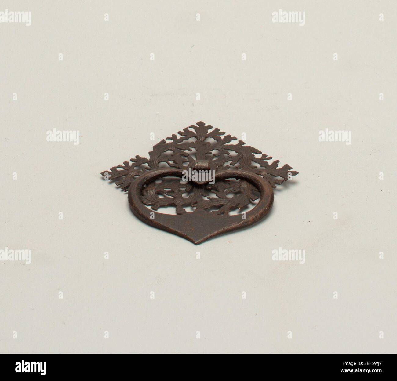 Drawer pull. With corners disposed on vertical and horizontal axes, the ...