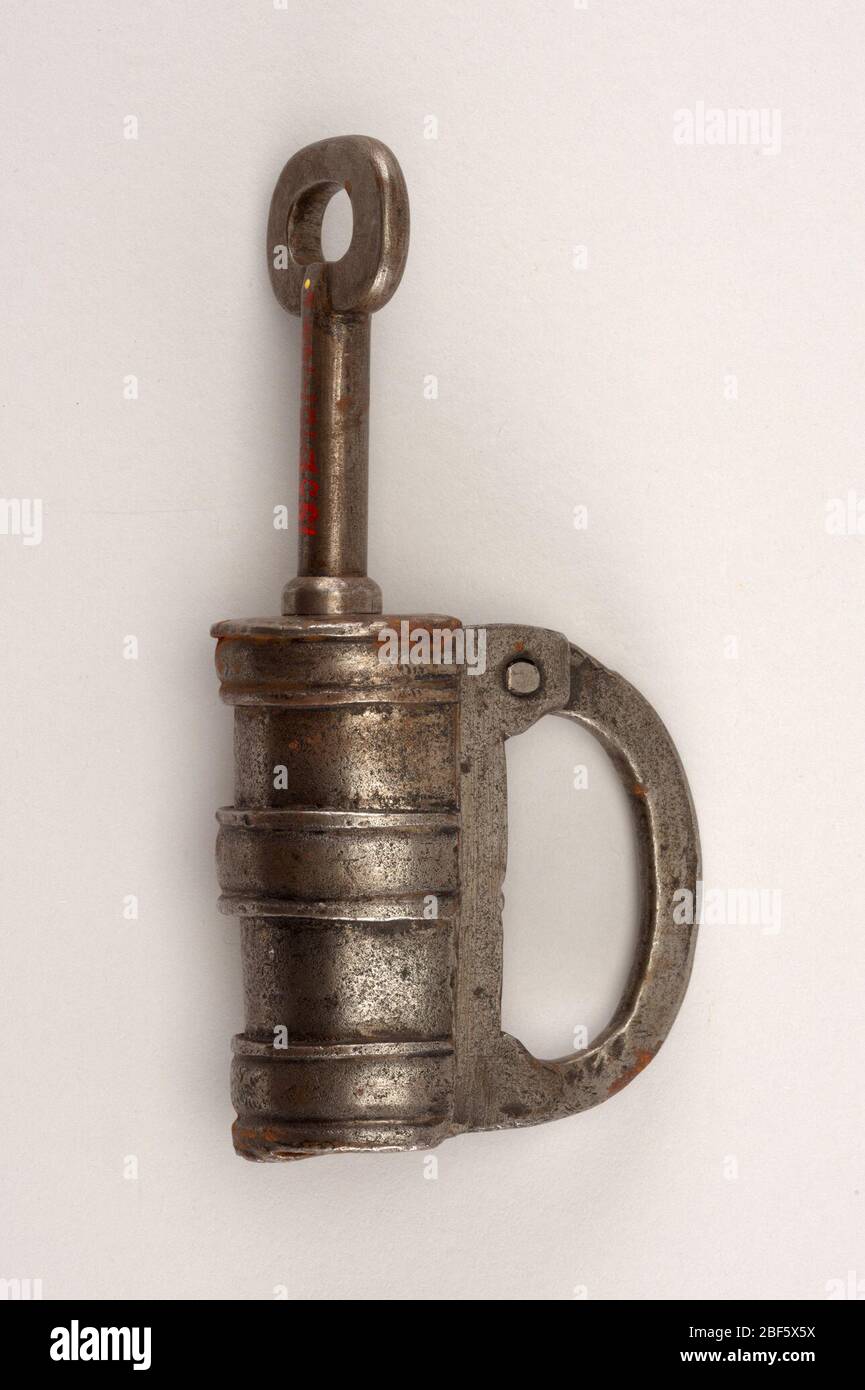 Lock with turn key. Barrel form lock chamber with hinged loop lock ...