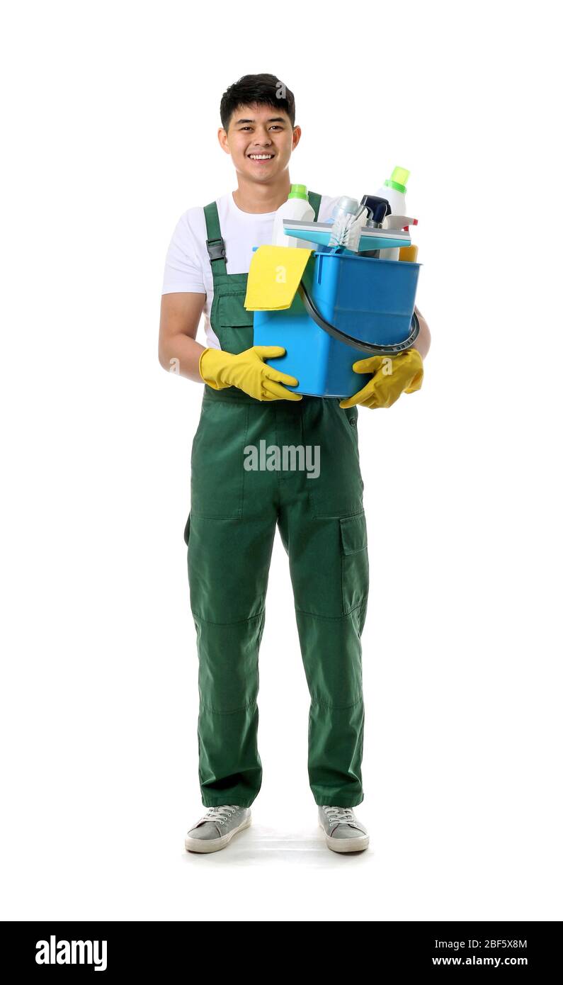 Asian janitor with cleaning supplies on white background Stock Photo ...