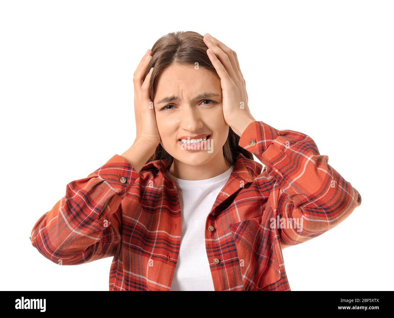 Bothered young woman on white background Stock Photo - Alamy