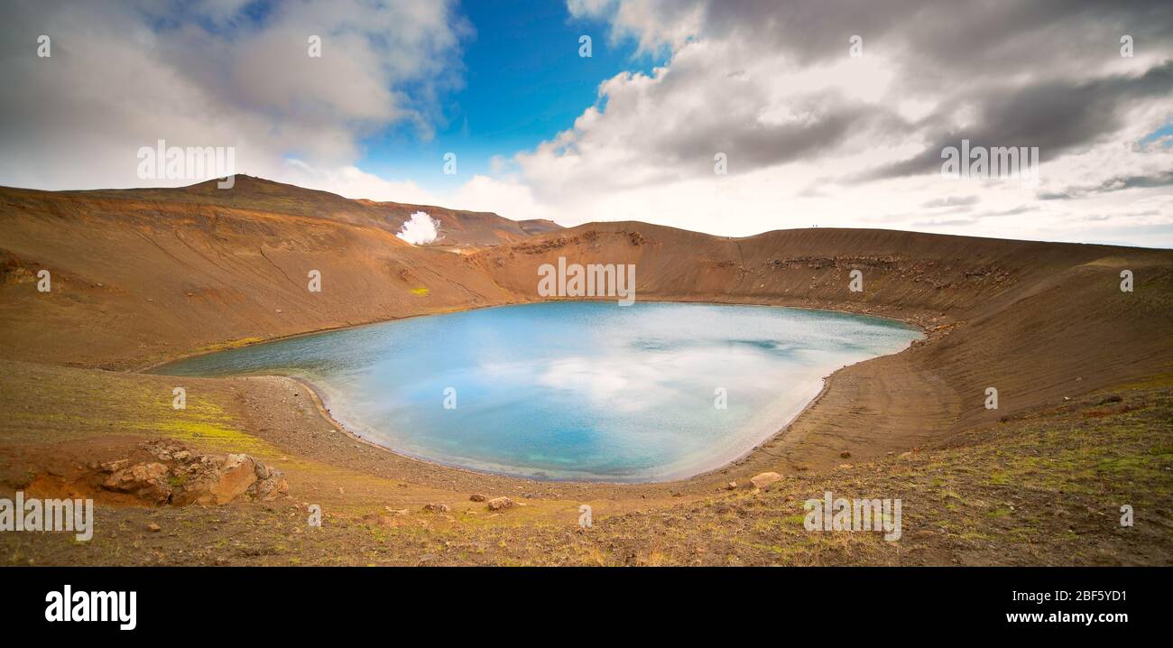 The mouth of a volcano crater filled with water in Iceland. Water Lake ...