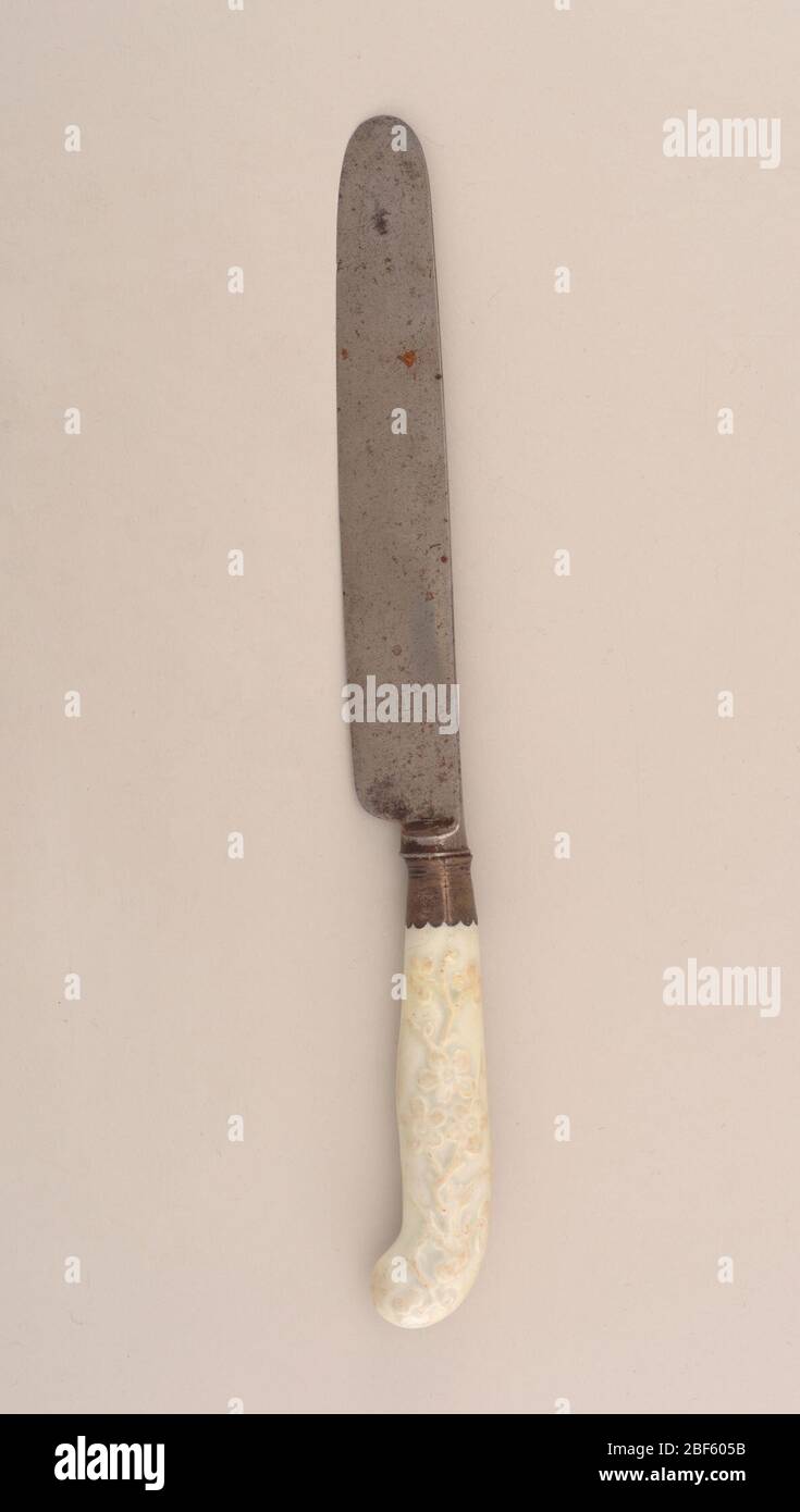 Knife. Straight-sided blade with rounded top, plain bolster. Silver ...