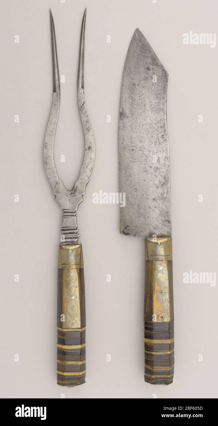 Fork. Large two-tined fork, tines curved and pointed. Bolster ...