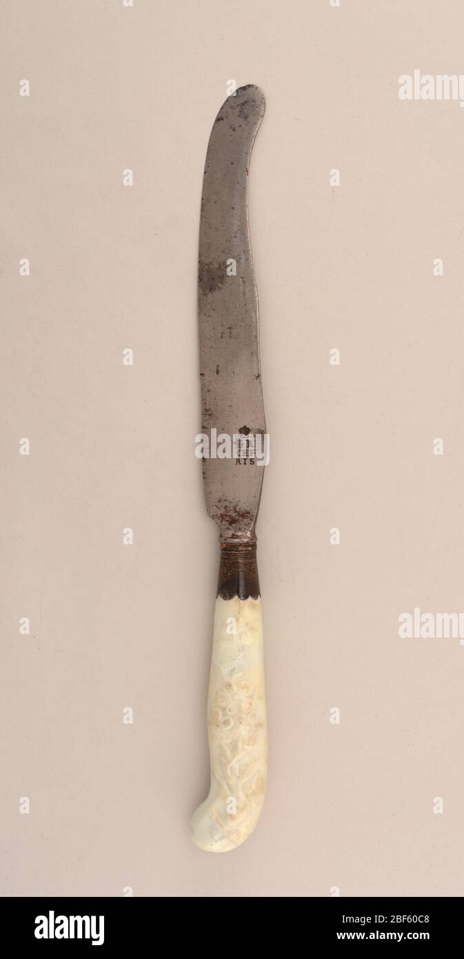 Knife. Sabre-shaped blade, plain bolster. Silver ferrule with scalloped ...