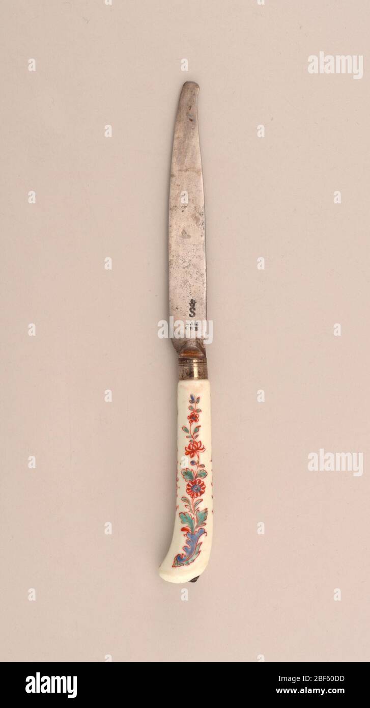 Knife. Sabre-shaped blade with drop bolster. Plain silver ferrule with ...