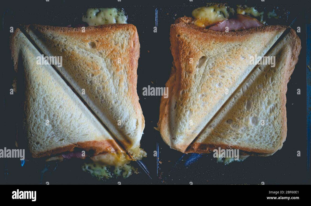 Cheesy triangles hi-res stock photography and images - Alamy