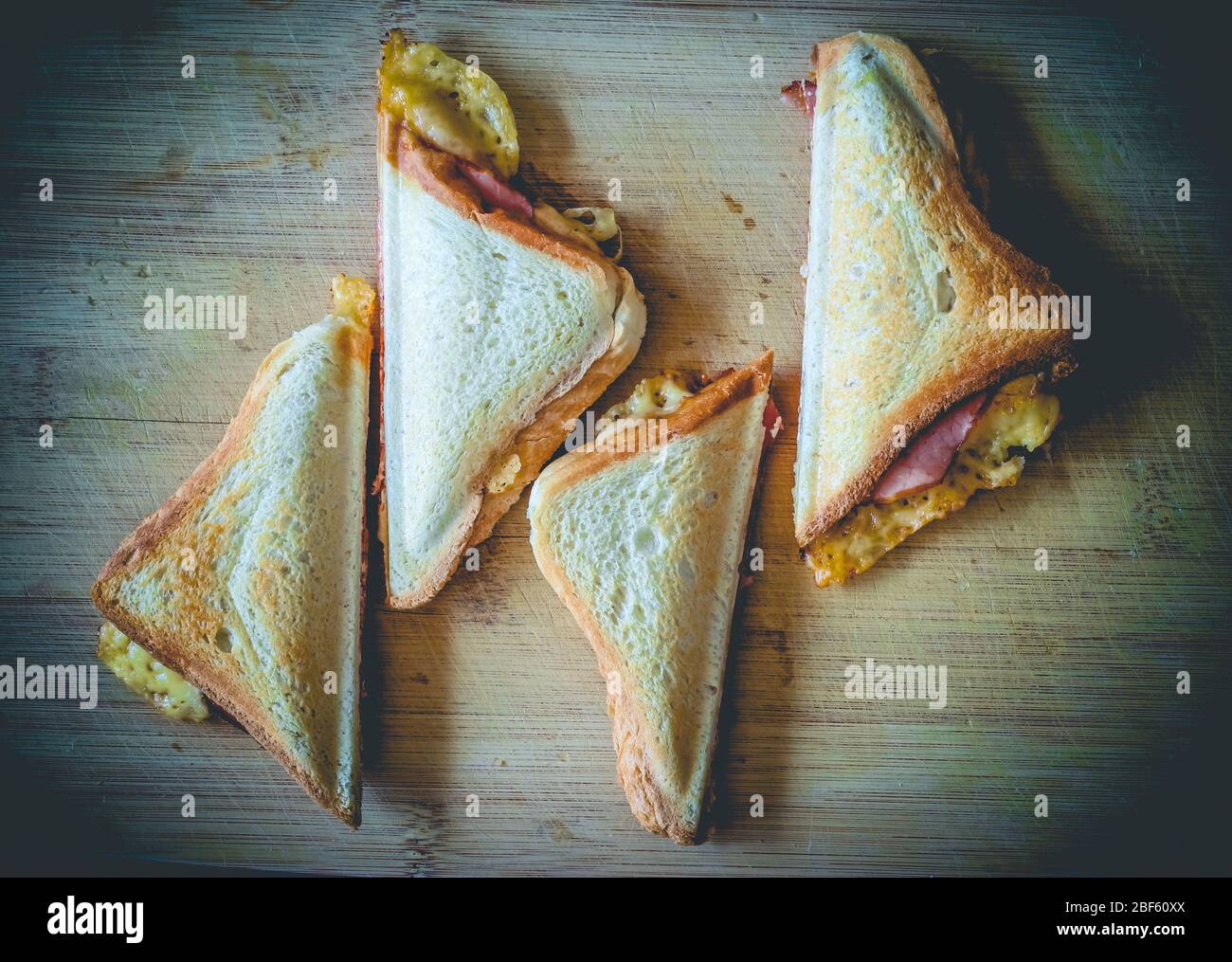Cheesy triangle hi-res stock photography and images - Alamy