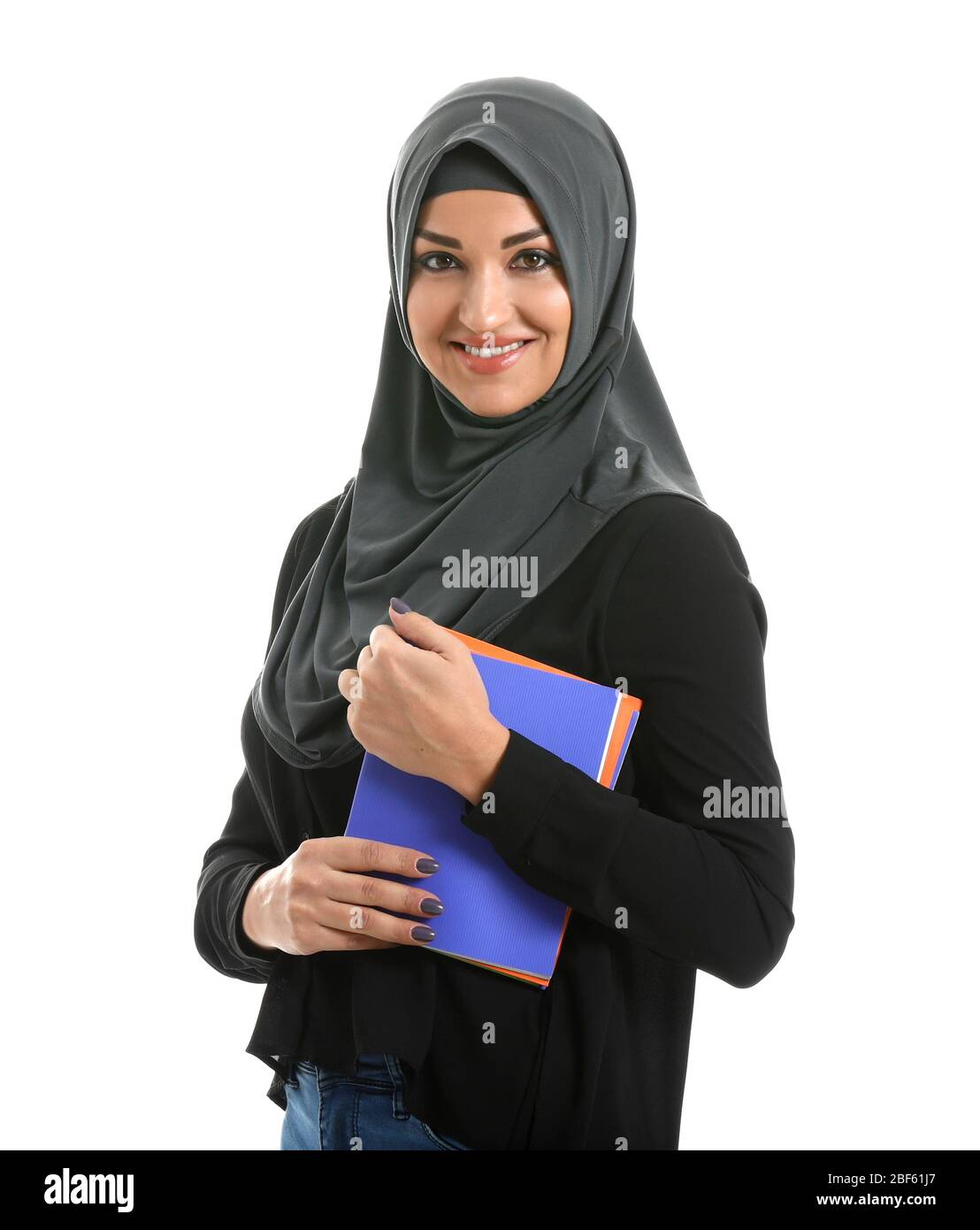 Female Arab student on white background Stock Photo - Alamy