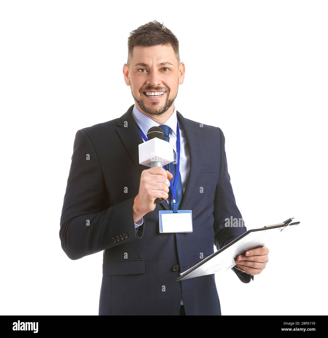 Male journalist with microphone on white background Stock Photo - Alamy