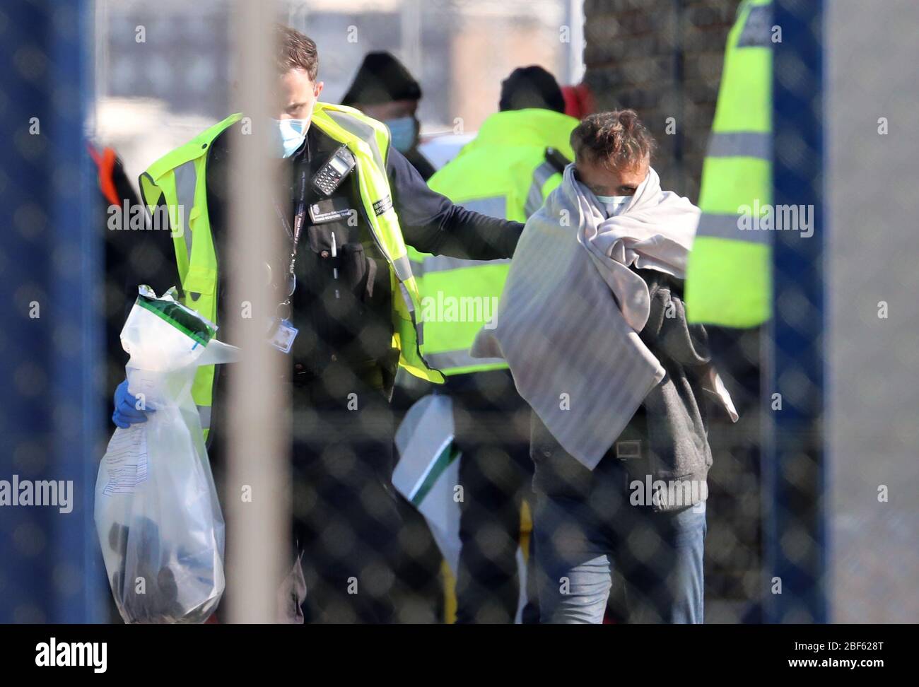 Border force officers process hi-res stock photography and images - Alamy