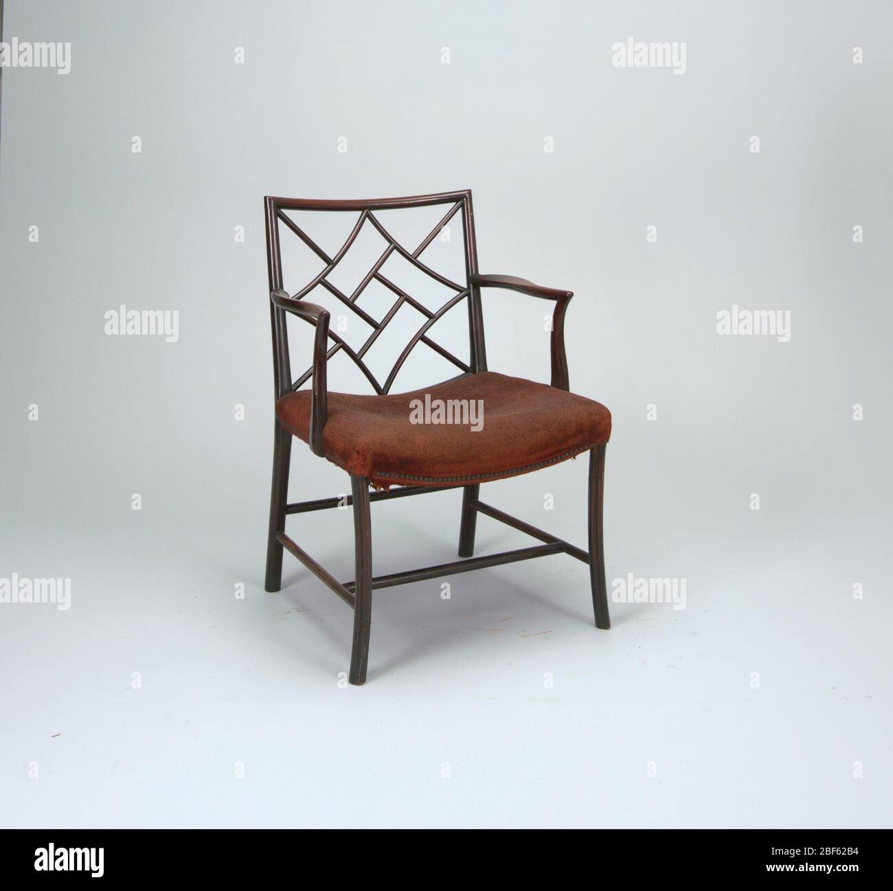 Chair. A side chair with a rectangular back filled with a lattice-work ...