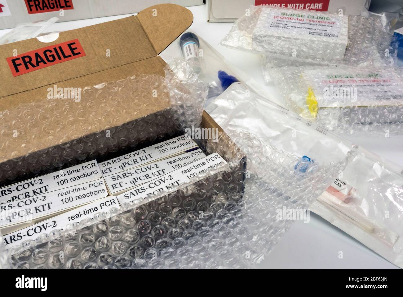 Boxes with Covid-19 PCR kit in hospital warehouse, conceptual image ...