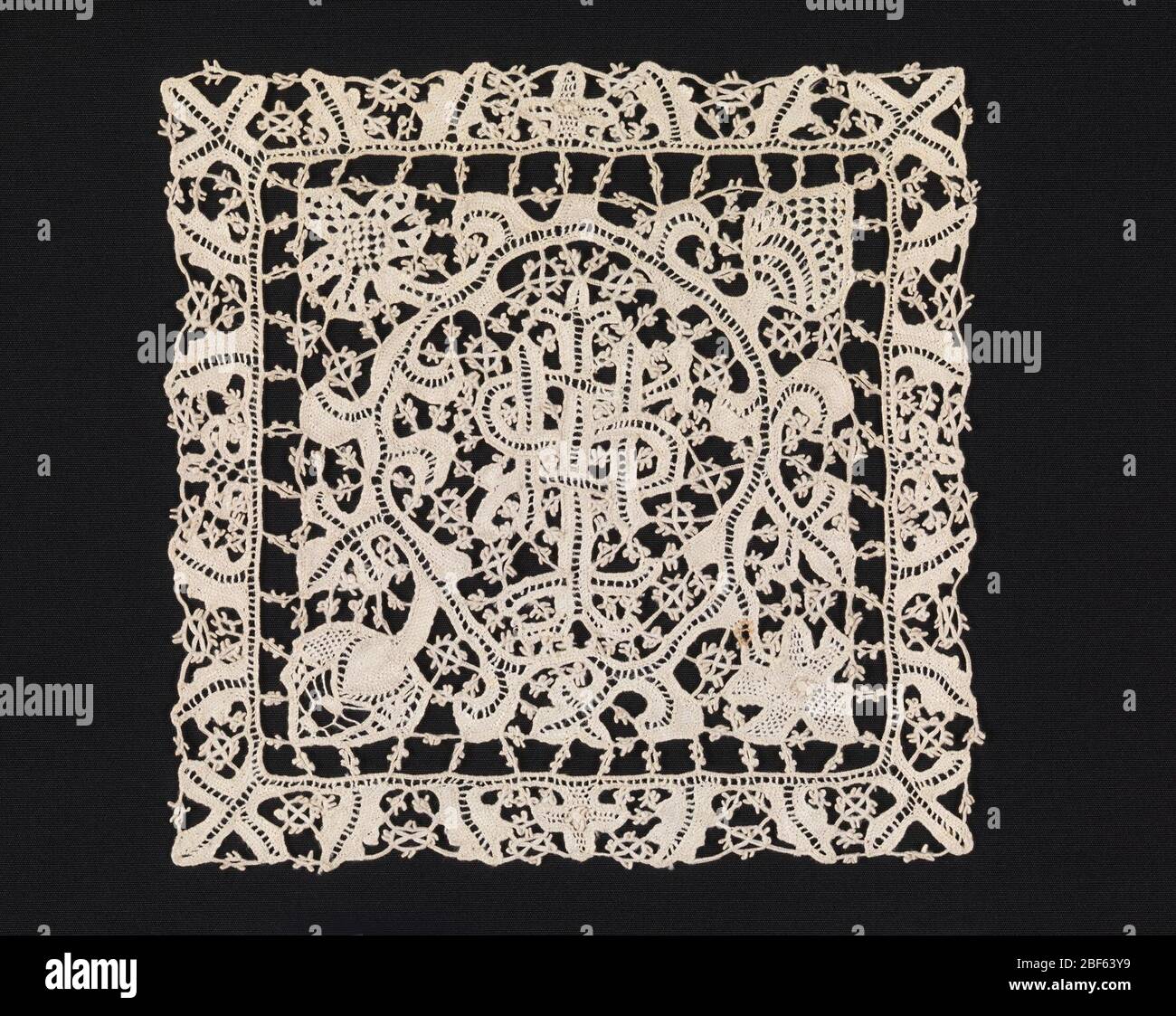 Chalice cover. In the center is a medallion containing the initials ...