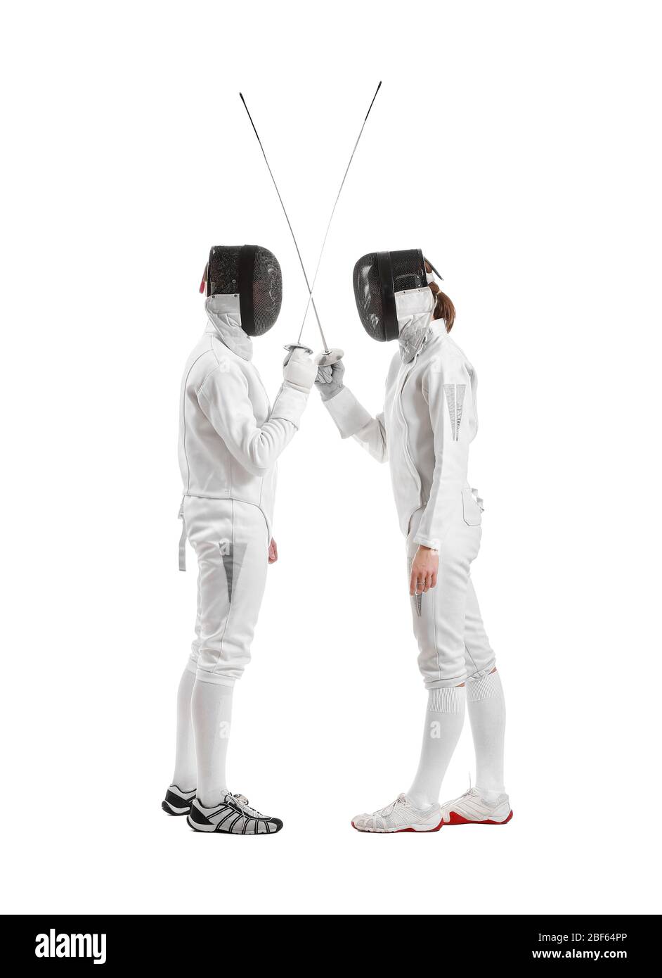 Young fencers on white background Stock Photo - Alamy
