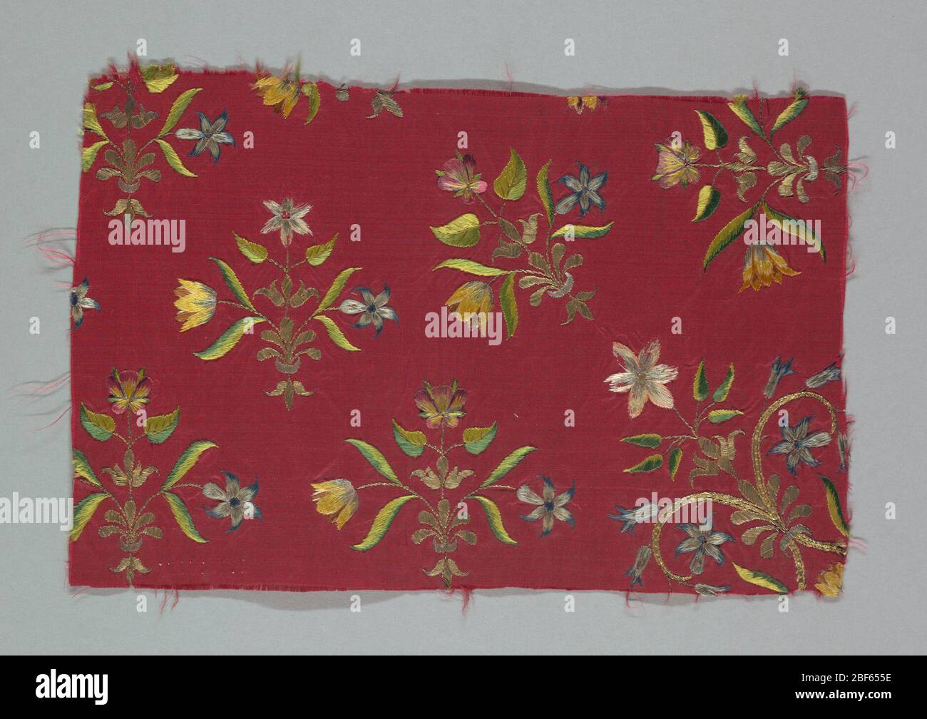 Embroidery. Red taffeta embroidered in floral design in polychrome ...
