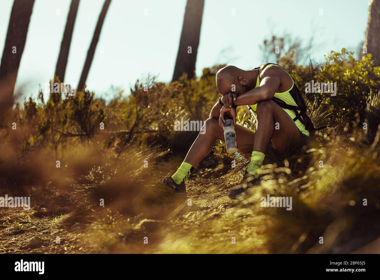 Male runner relaxing after training hi-res stock photography and images ...