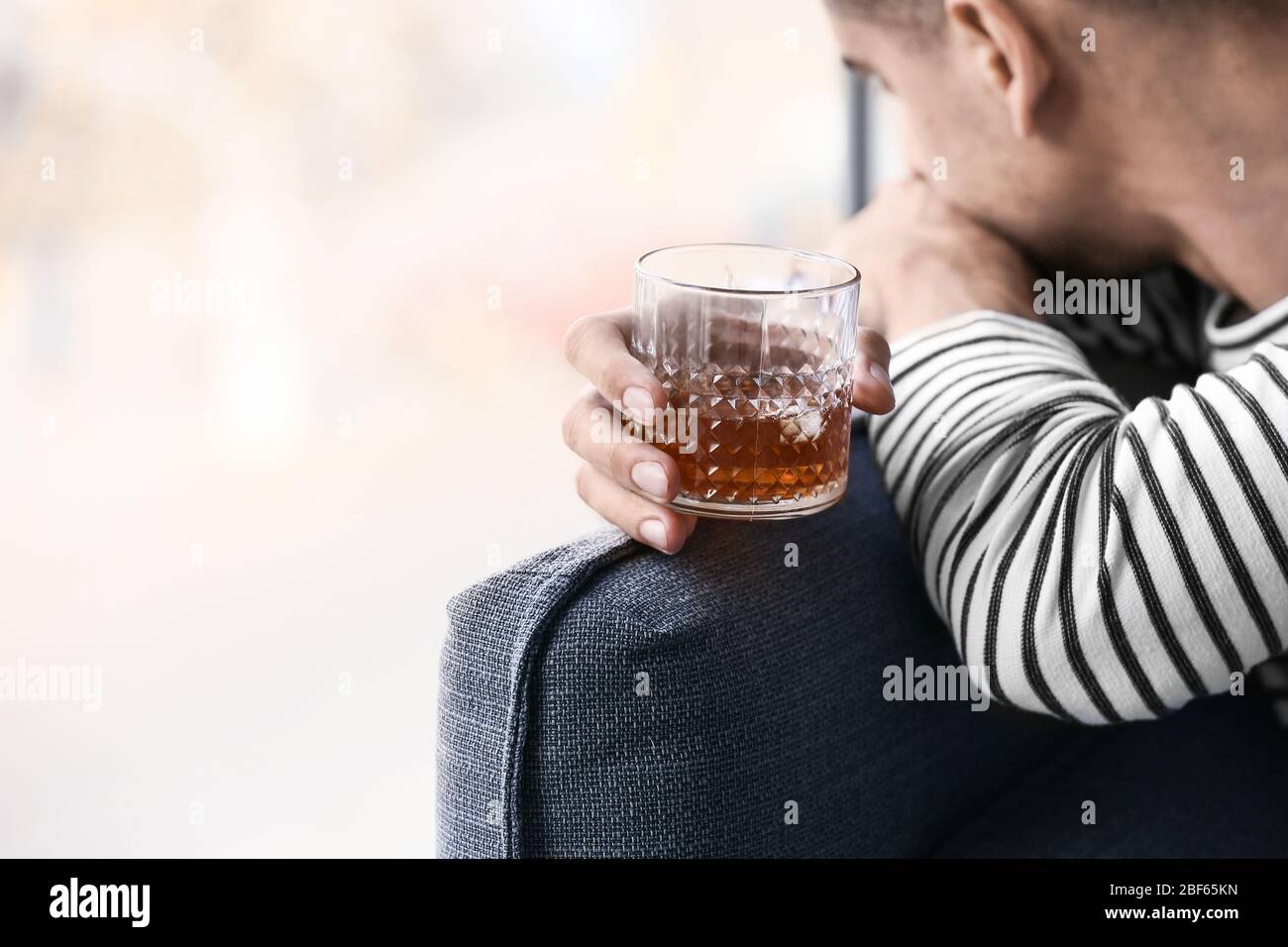 Man drinking alcohol at home hi-res stock photography and images - Alamy