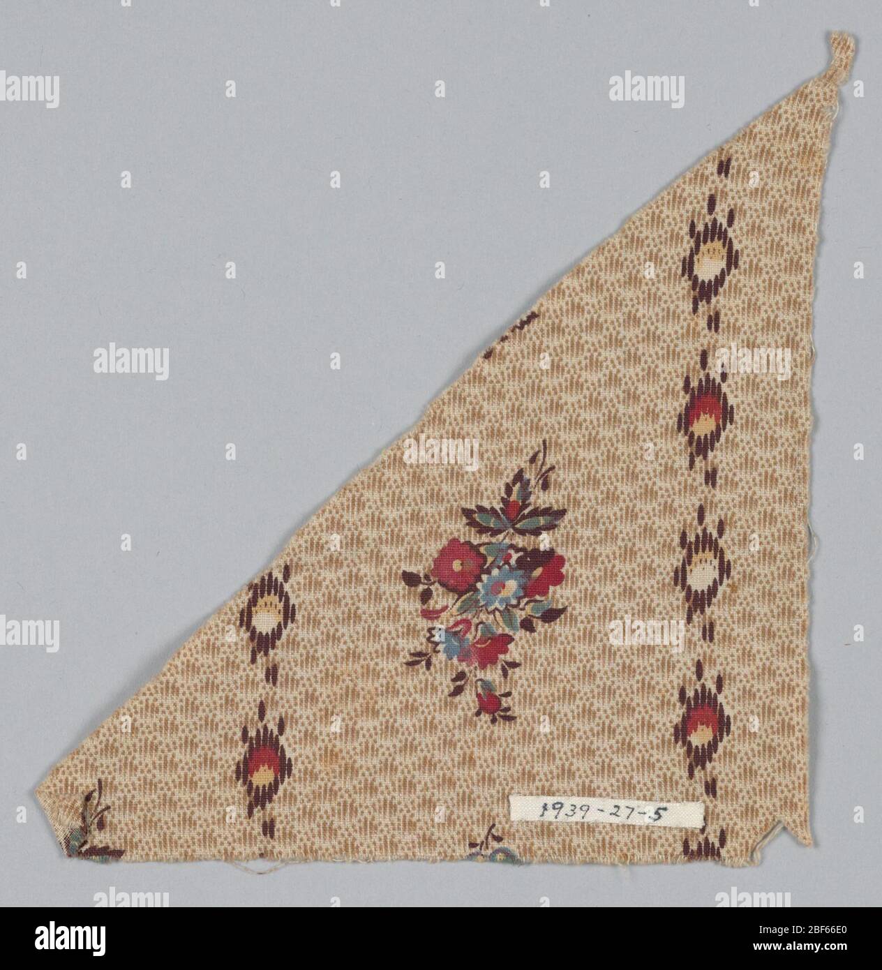 Fragment. Triangular-shaped fragment with alternating vertical columns ...