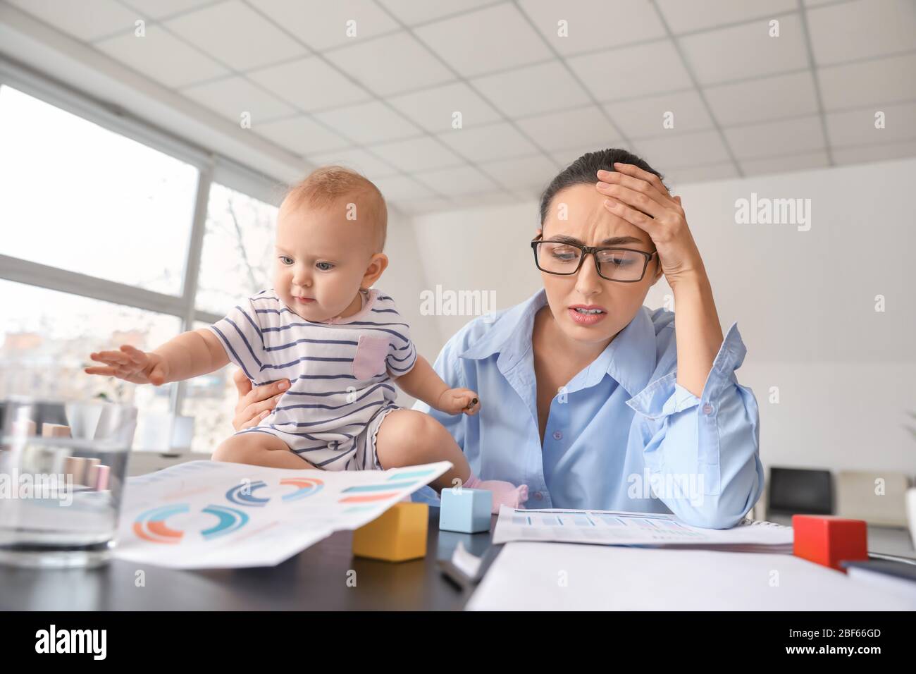 Working mother stressed hi-res stock photography and images - Alamy