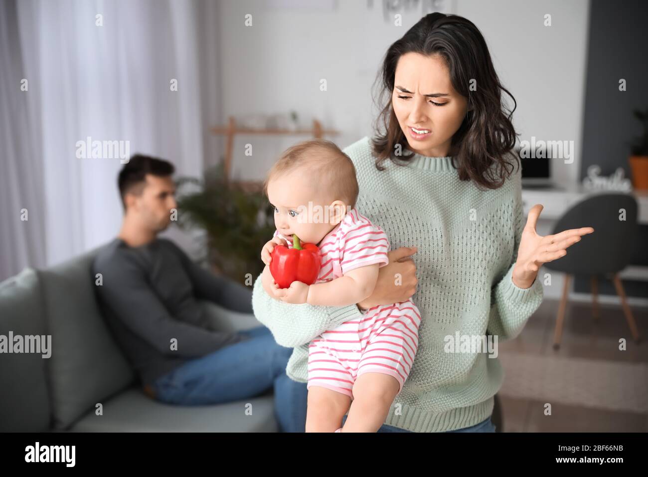 Young woman suffering from postnatal depression at home Stock Photo - Alamy