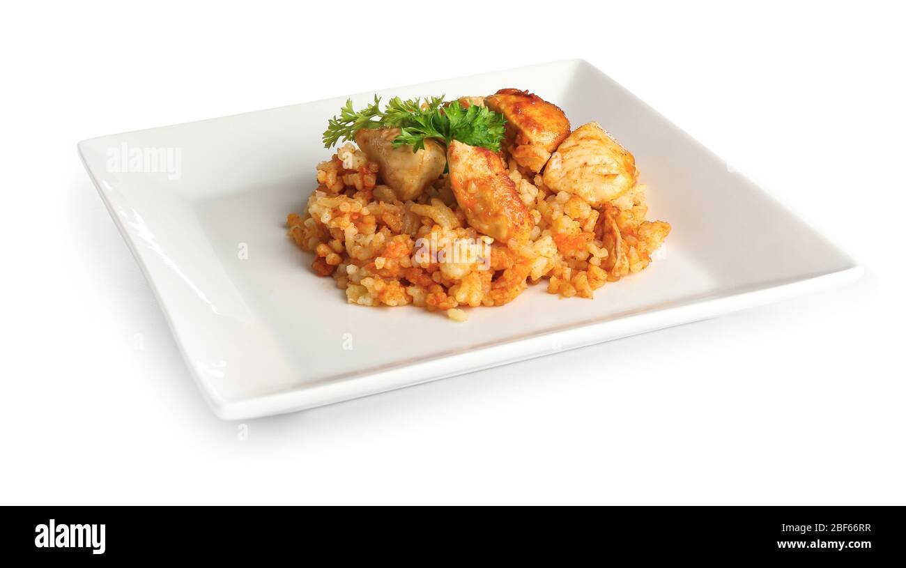 Plate with tasty rice and chicken on white background Stock Photo - Alamy