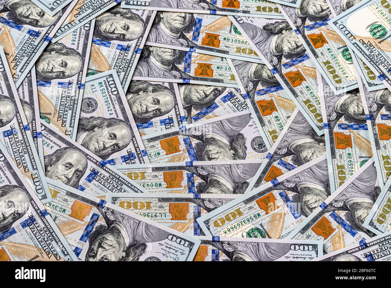 Background from hundred dollar banknotes. The concept of wealth and ...