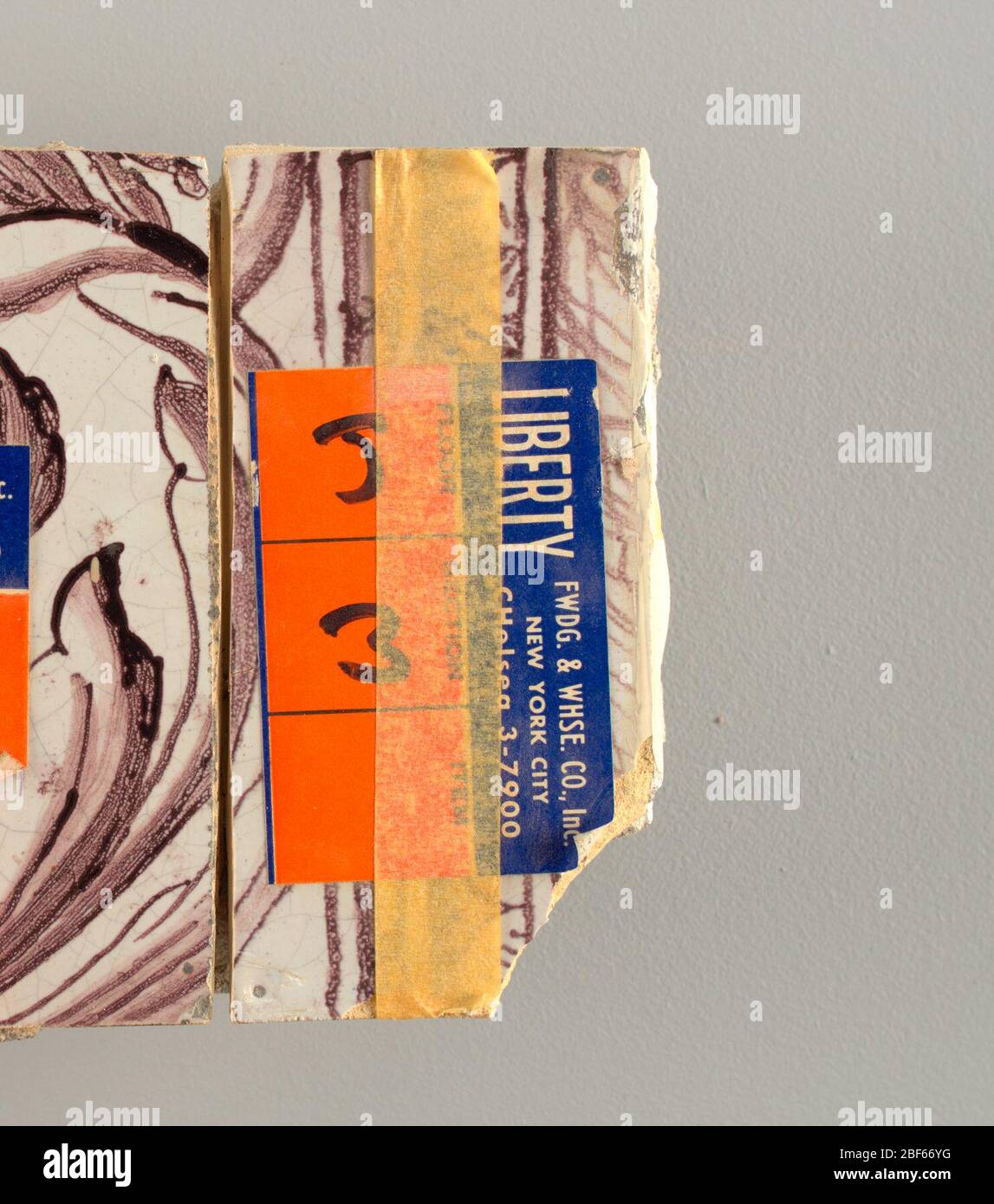 Wall facing. Two vertical rectangles, twenty-three tiles high. A) Nine ...