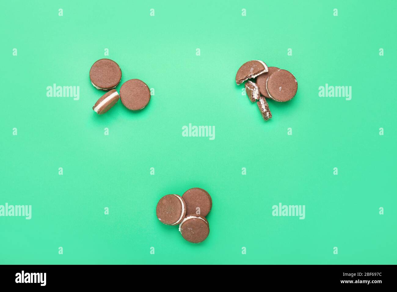 Tasty chocolate cookies on color background Stock Photo - Alamy