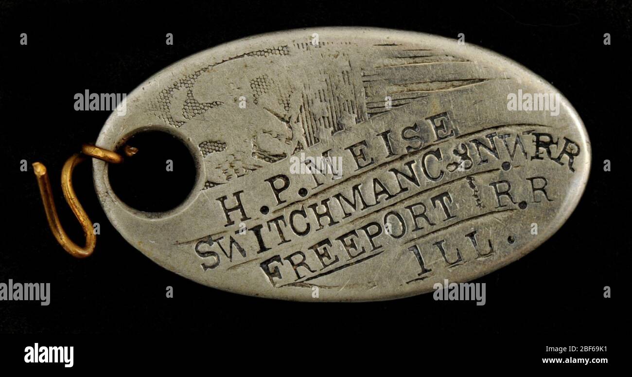 Chicago Northwestern Railroad Owney tag. The design of this oval-shaped ...