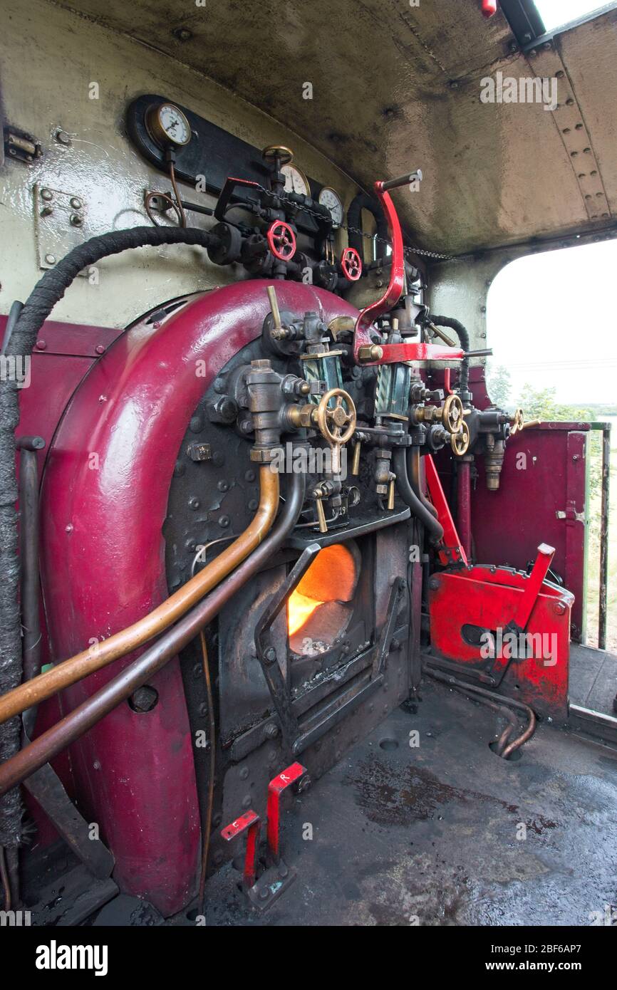 Cab interior of an ancient steam saddletank locomotive Stock Photo - Alamy
