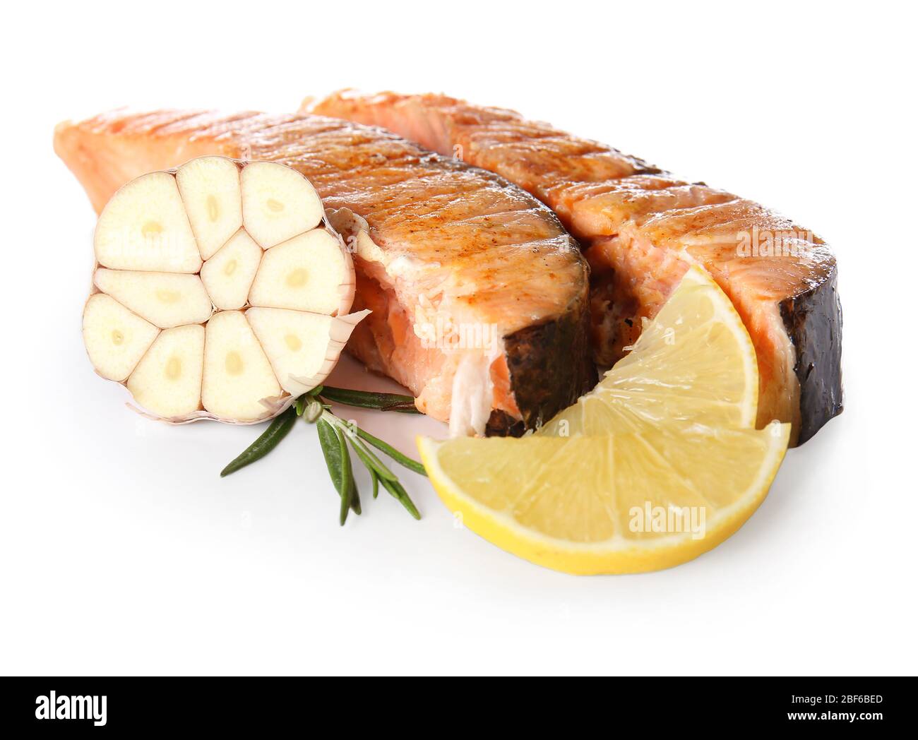 Tasty cooked salmon on white background Stock Photo - Alamy