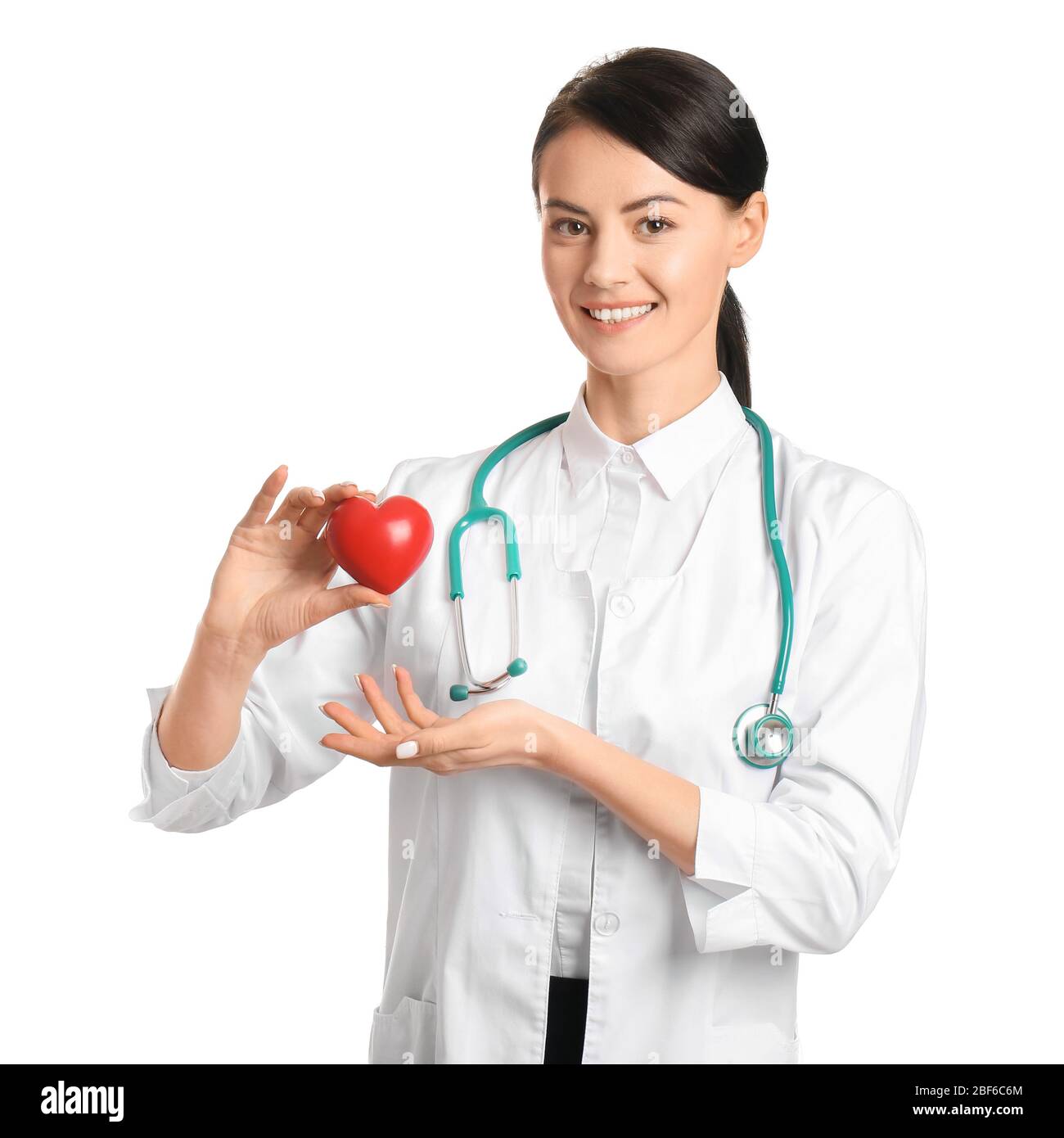 Female cardiologist on white background Stock Photo - Alamy