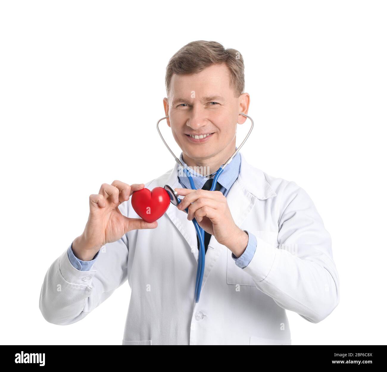 Male cardiologist on white background Stock Photo - Alamy