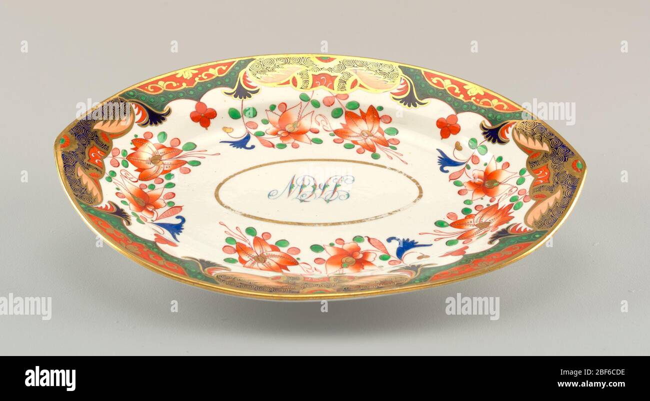 Oval Platter with Monogram. Almond-shaped platter decorated near border ...