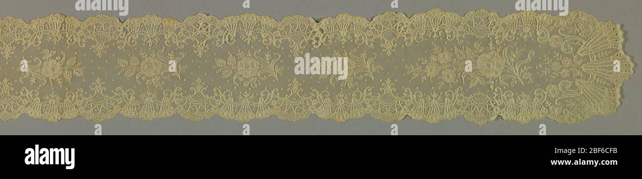 Cap streamer. Cap streamer of Mechlin lace worked with a design of rose ...