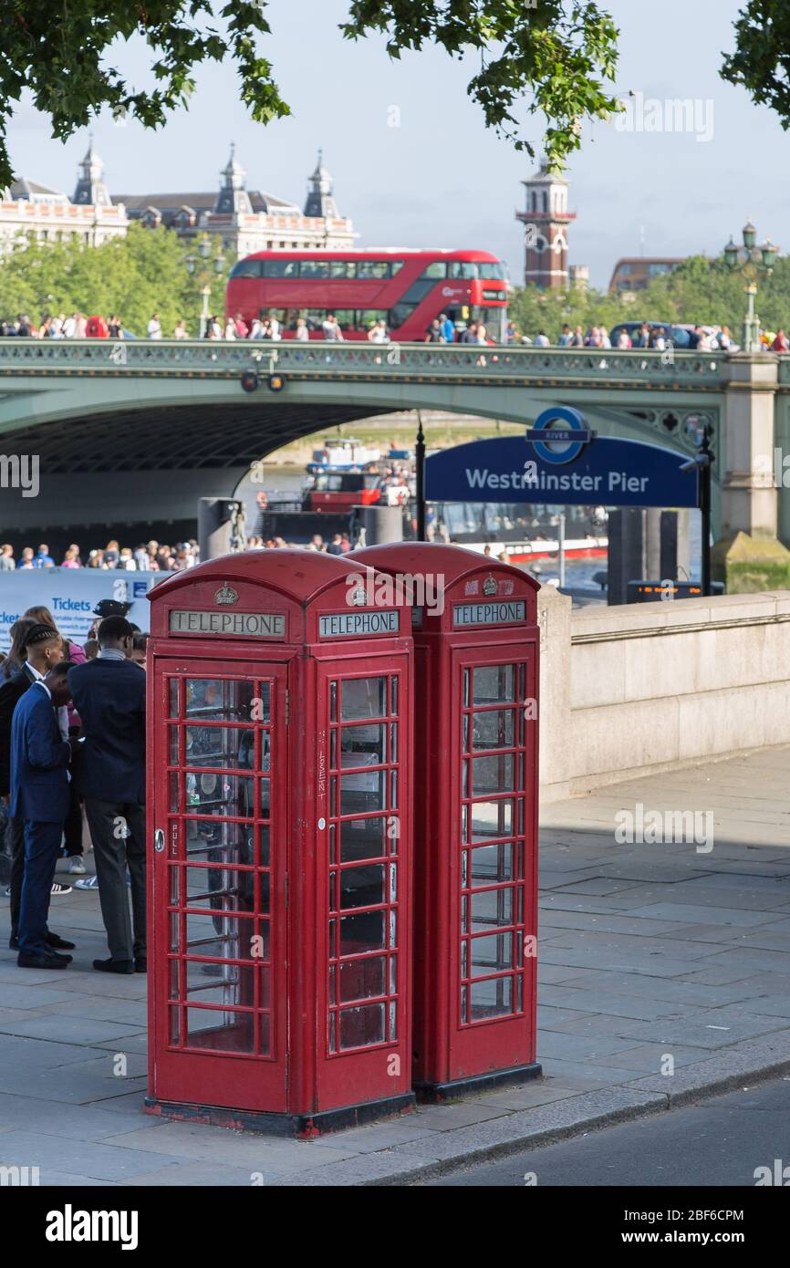 Two Vintage Red Phone Call Boxes and Westminster Bridge in background ...
